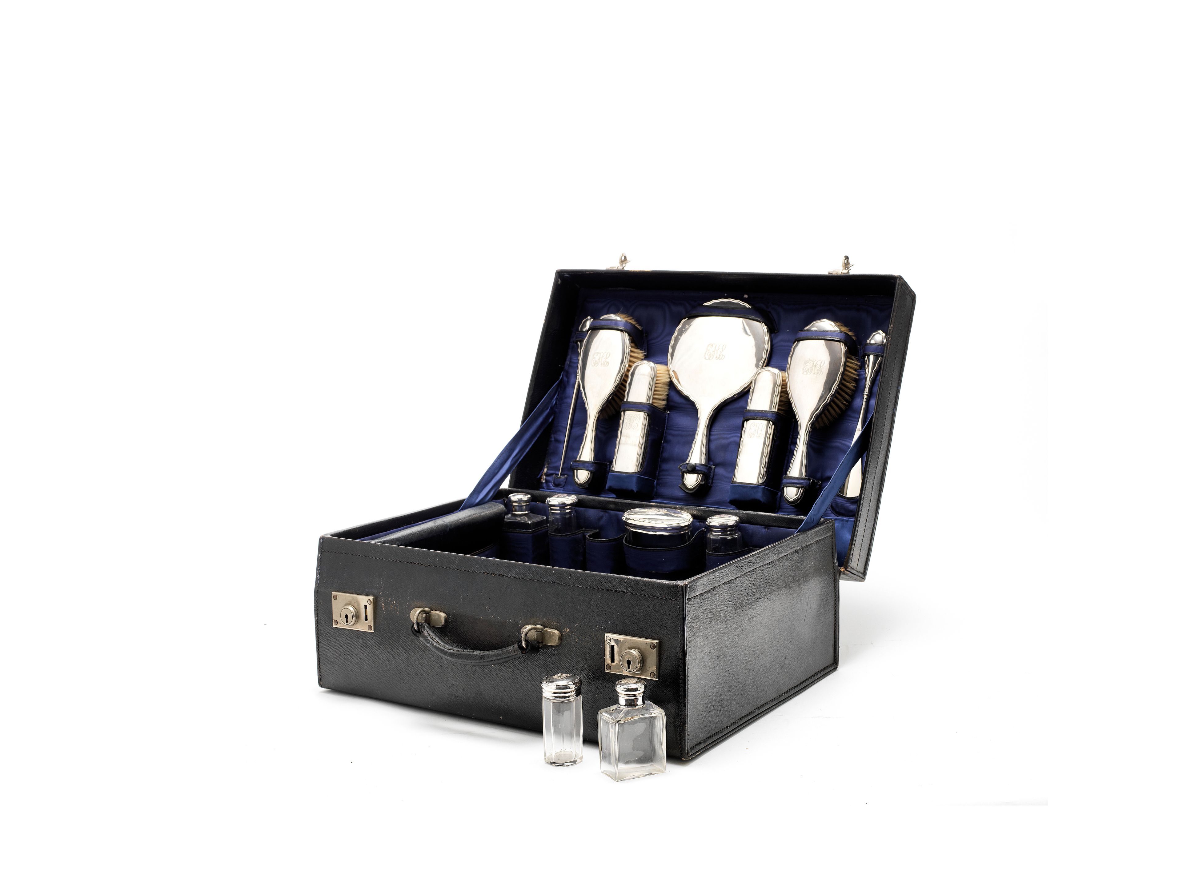 Bonhams Cars : A leather-cased vanity set with sterling silver ...