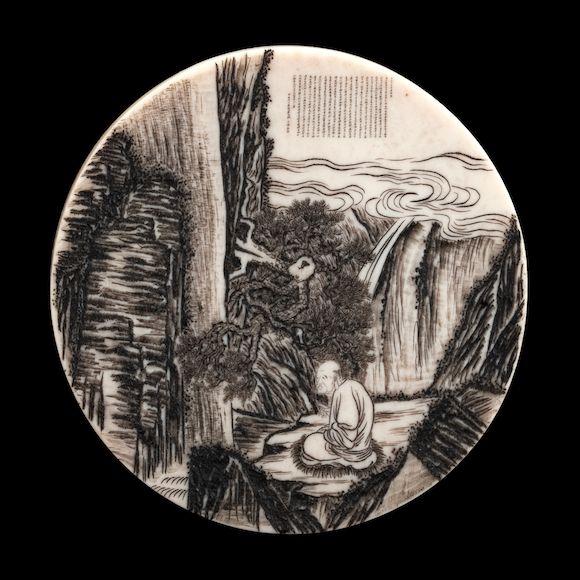 Bonhams : An inscribed circular ivory disc 20th century