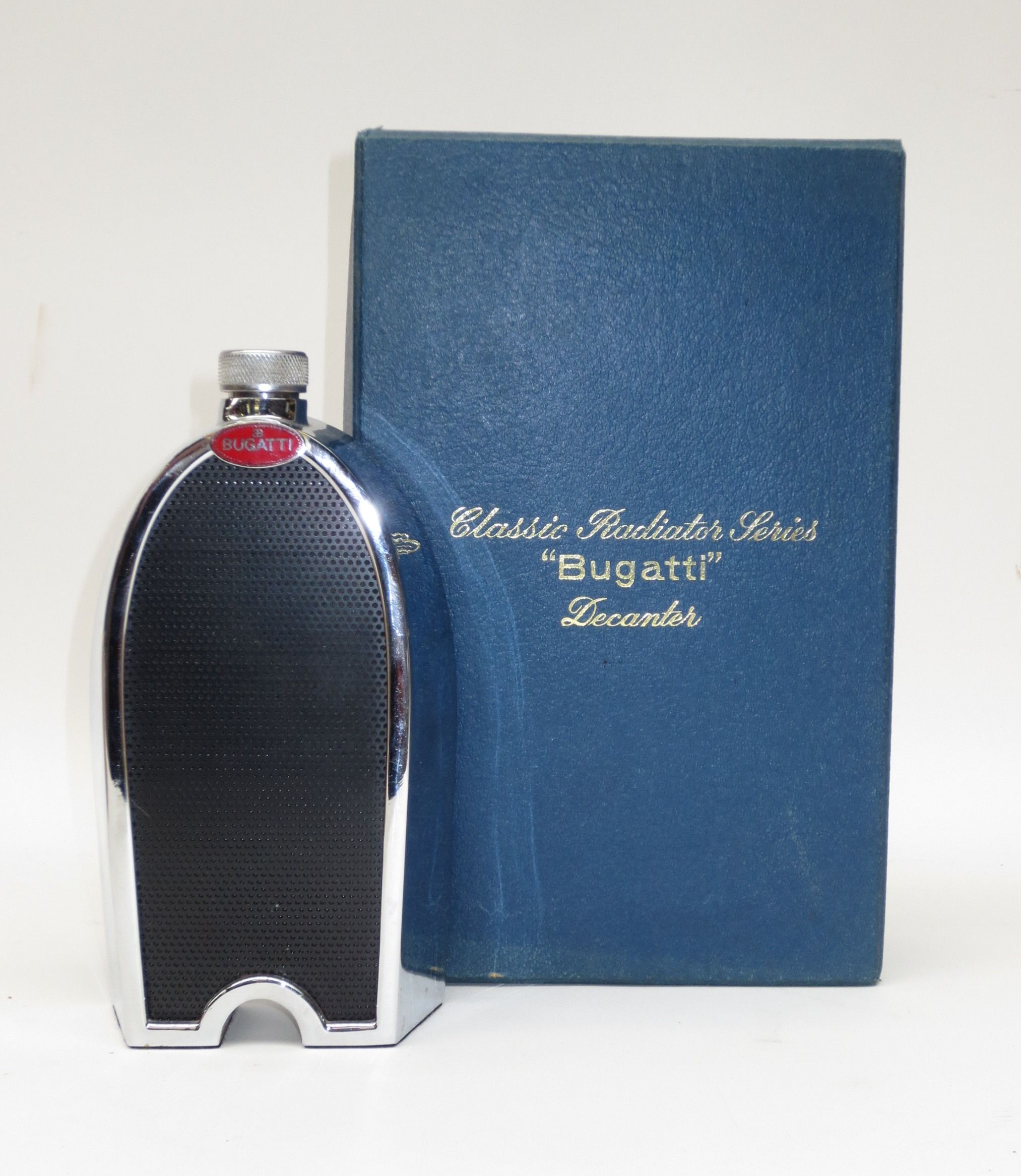 Bonhams Cars : A cased Bugatti radiator decanter, by Ruddspeed,