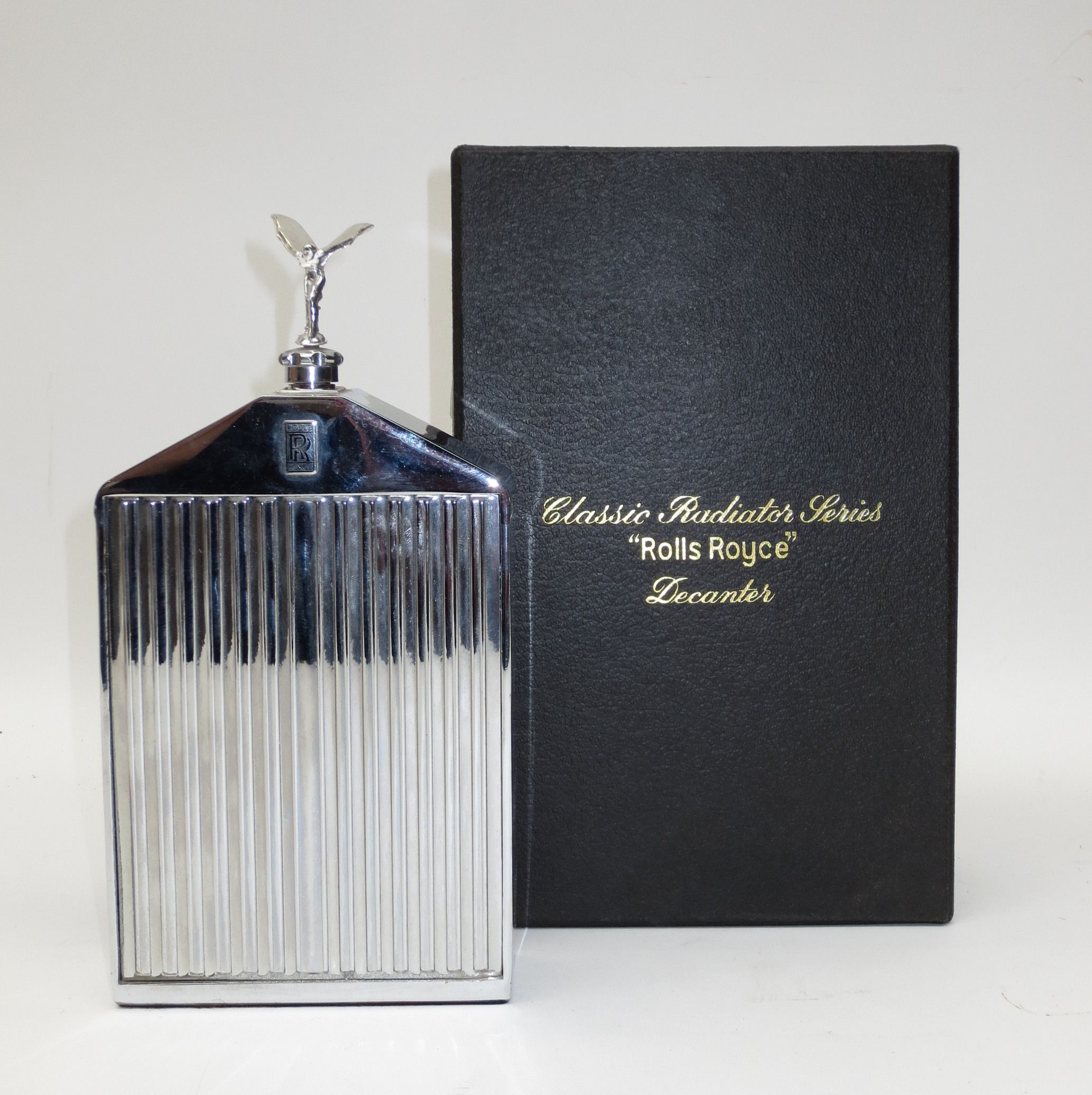 Bonhams Cars : A cased Rolls-Royce radiator decanter, by Ruddspeed,