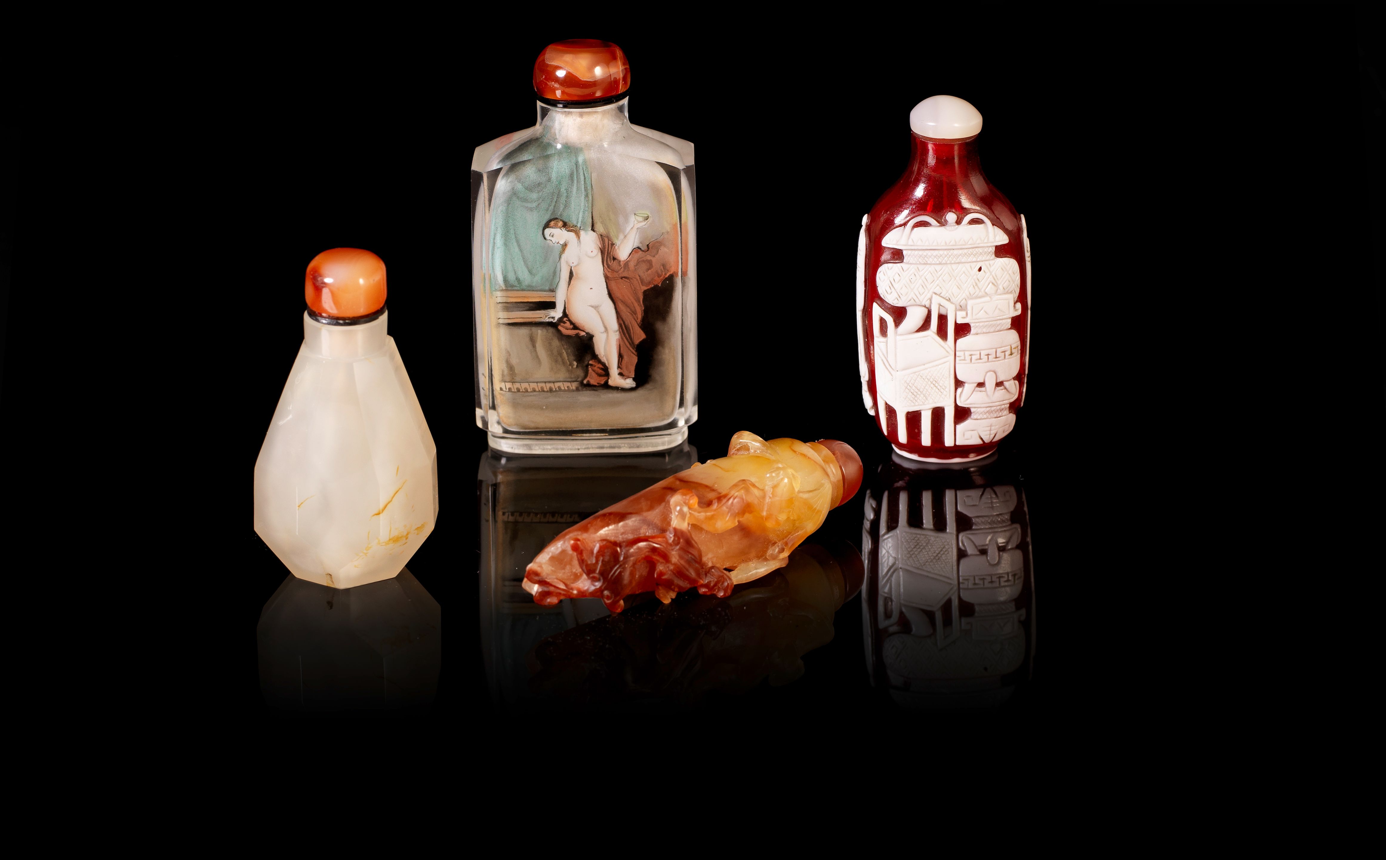 Bonhams : A small collection of four snuff bottles Late Qing Dynasty ...