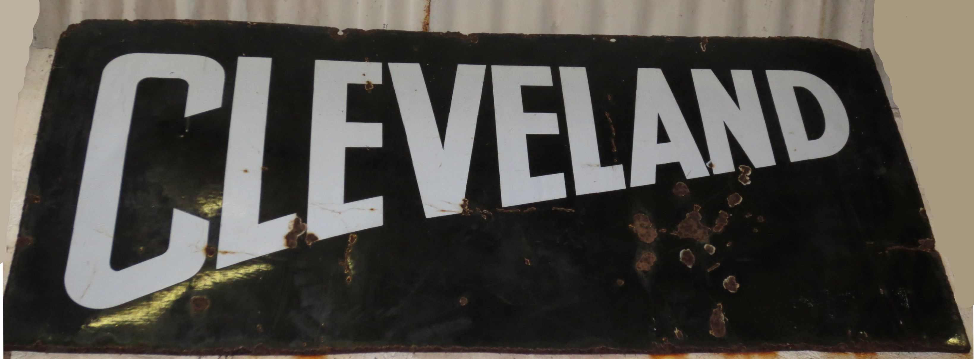 Bonhams Cars : A Cleveland enamel sign,
