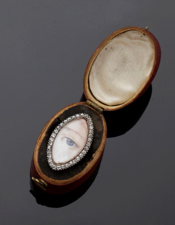 Bonhams : A painted eye portrait ring
