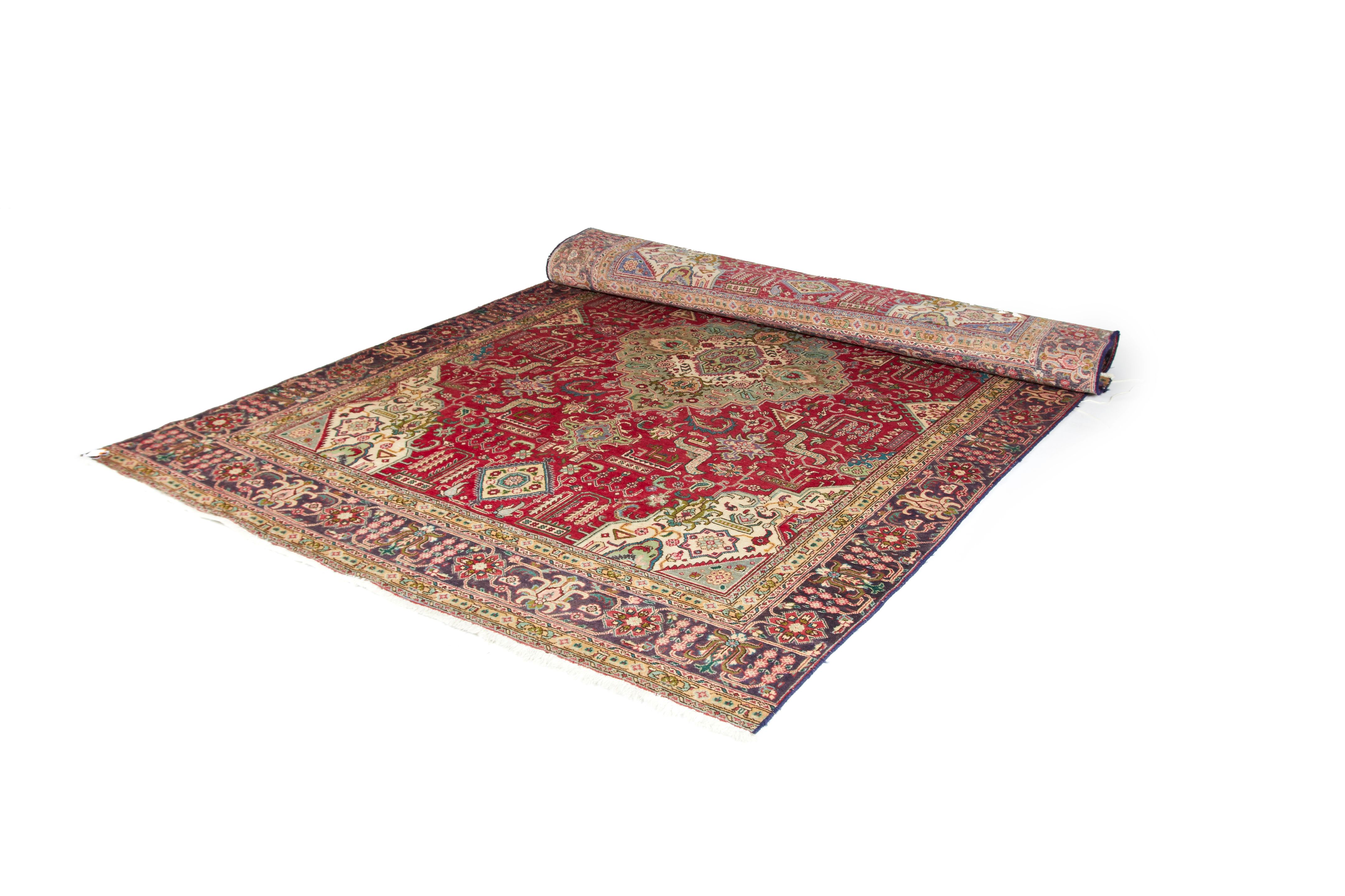Bonhams : A Tabriz room size carpet, central panel with lozenge and ...