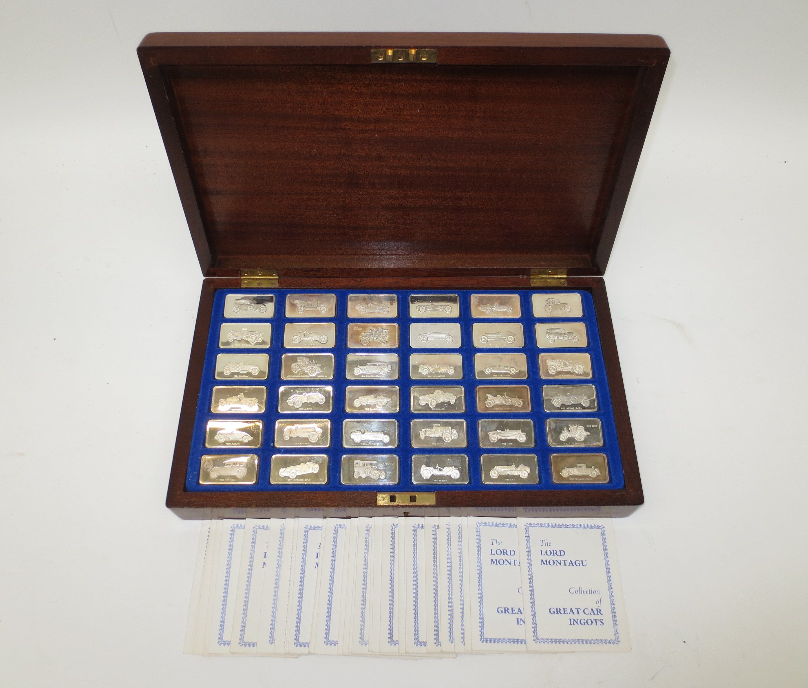 Bonhams Cars : A cased set of 36 sterling silver commemorative motoring ...