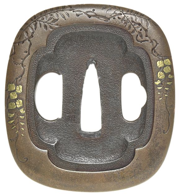 Bonhams : An iron tsuba with copper rim After Kano Natsuo, 19th century