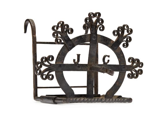 Bonhams : A small wrought iron sliding bar-grate toaster, probably Scottish