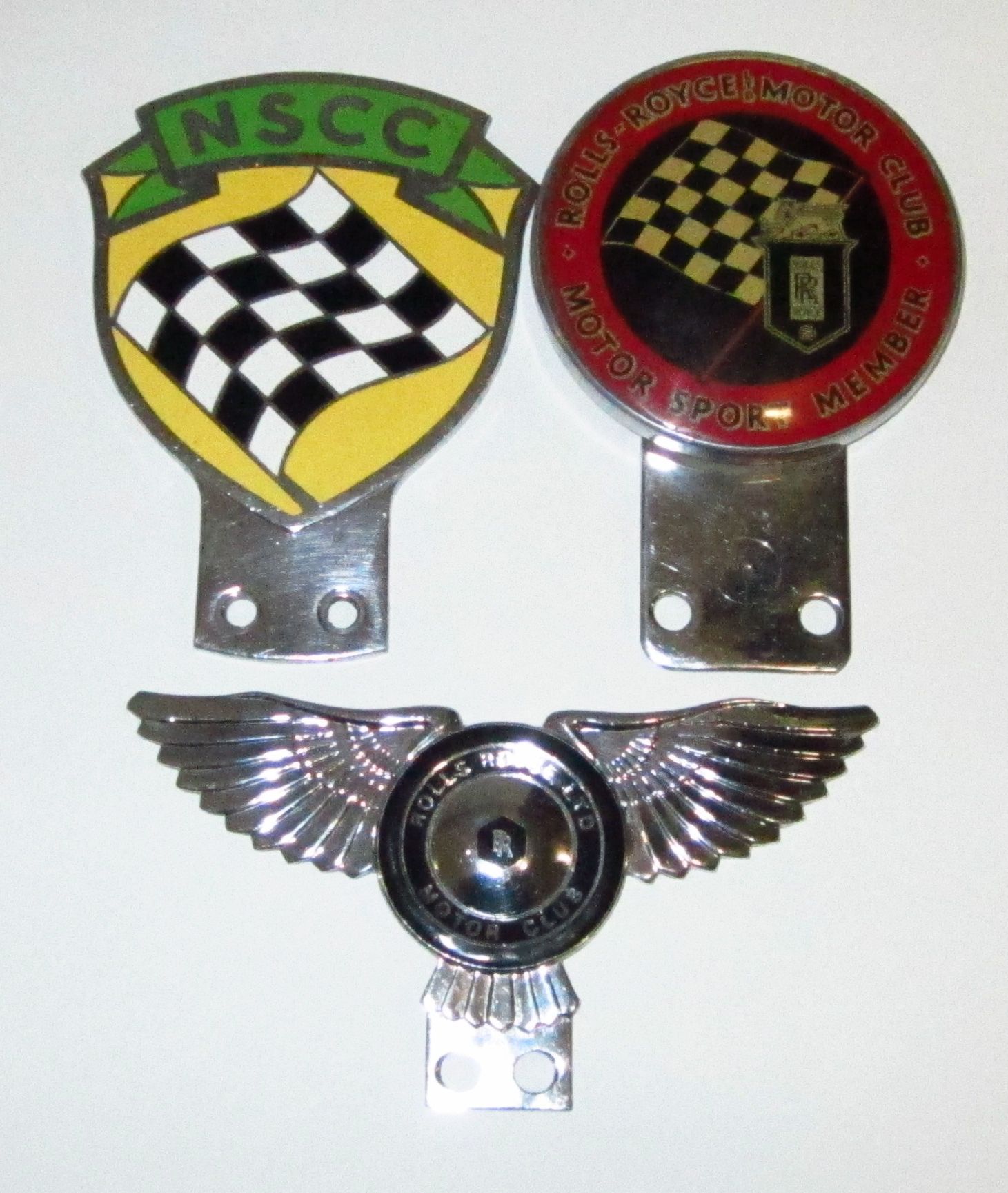 Bonhams Cars : Two Rolls-Royce Limited Motor Club badges,