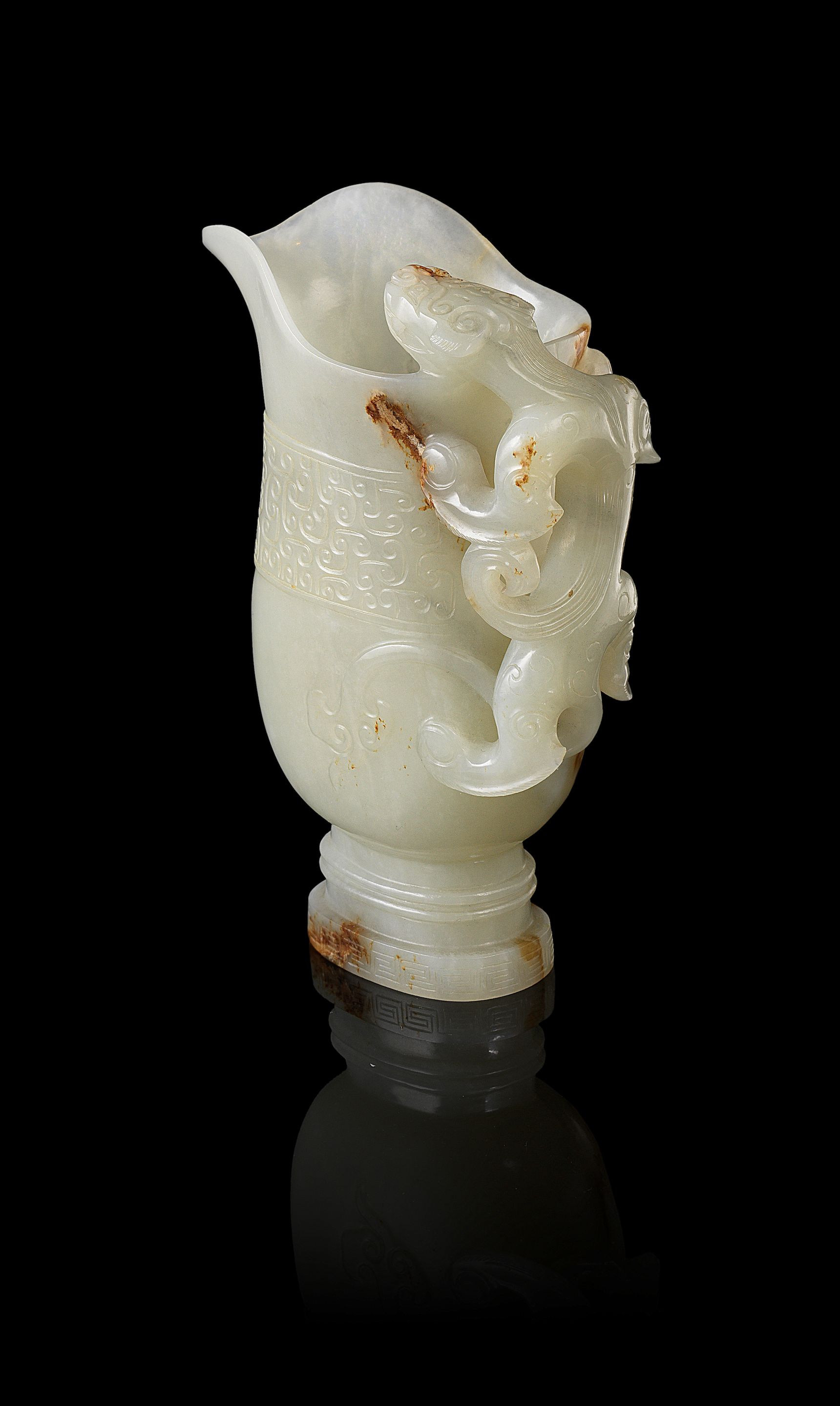 Bonhams : A pale green jade rhyton cup 17th/18th century