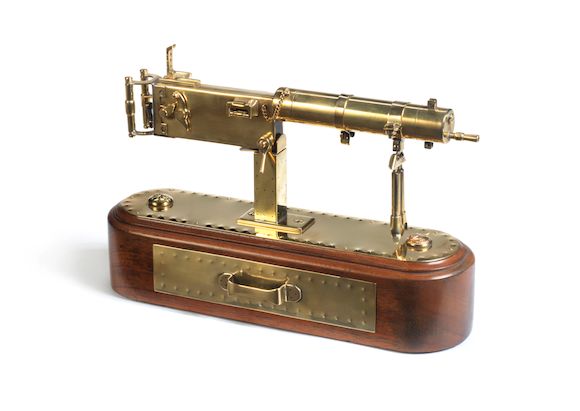 Bonhams : A polished brass Machine gun compendium