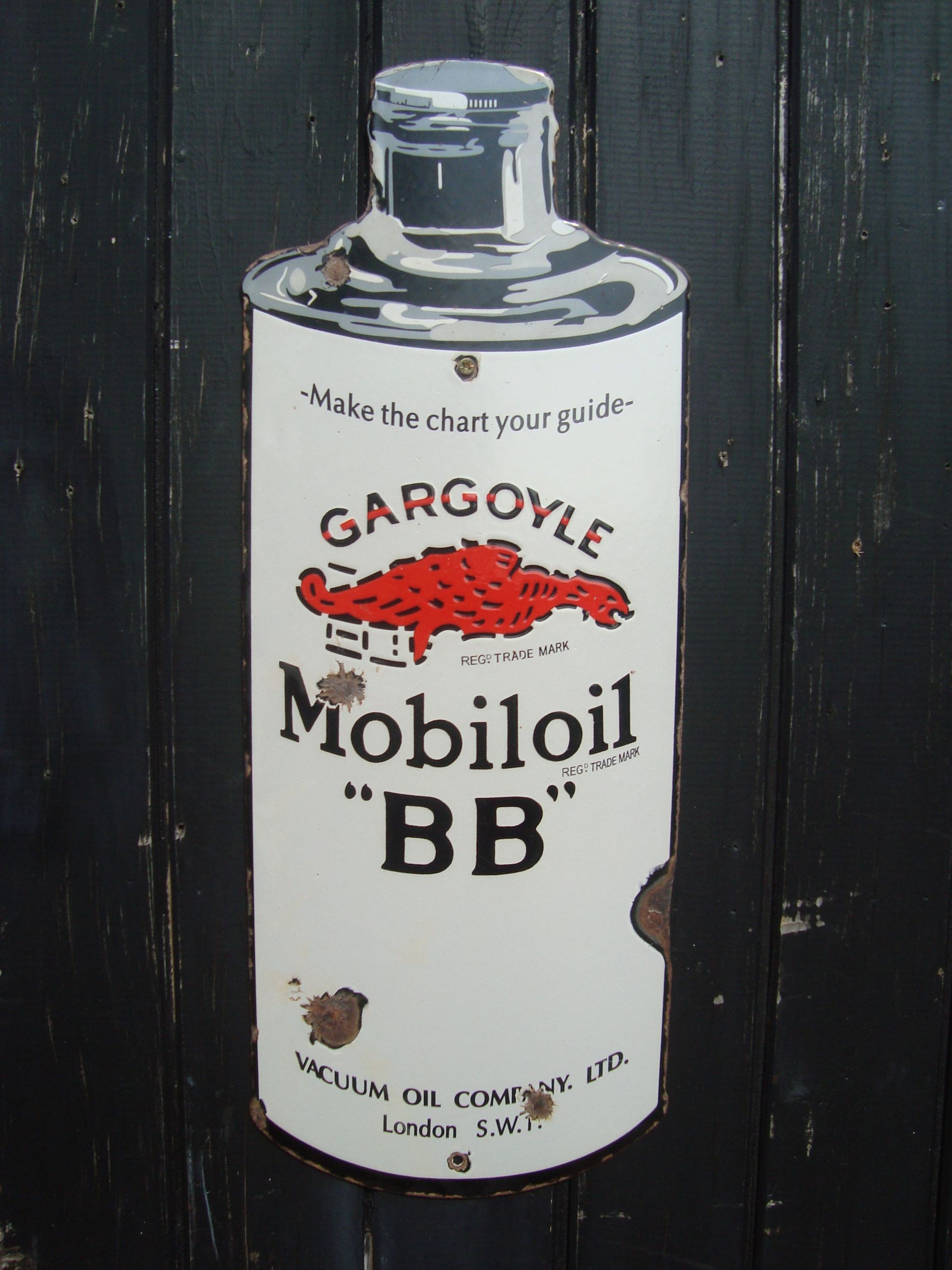 Bonhams Cars : A Mobiloil BB oil can enamel sign,