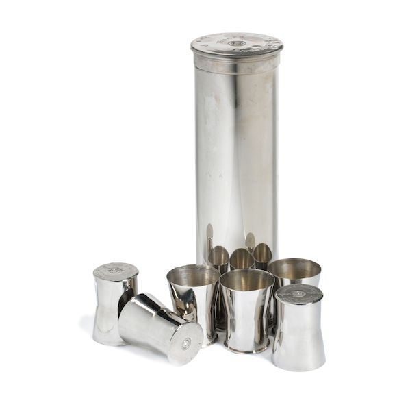 Bonhams : A 1916 Artillery Shell cocktail shaker set and six shot cups