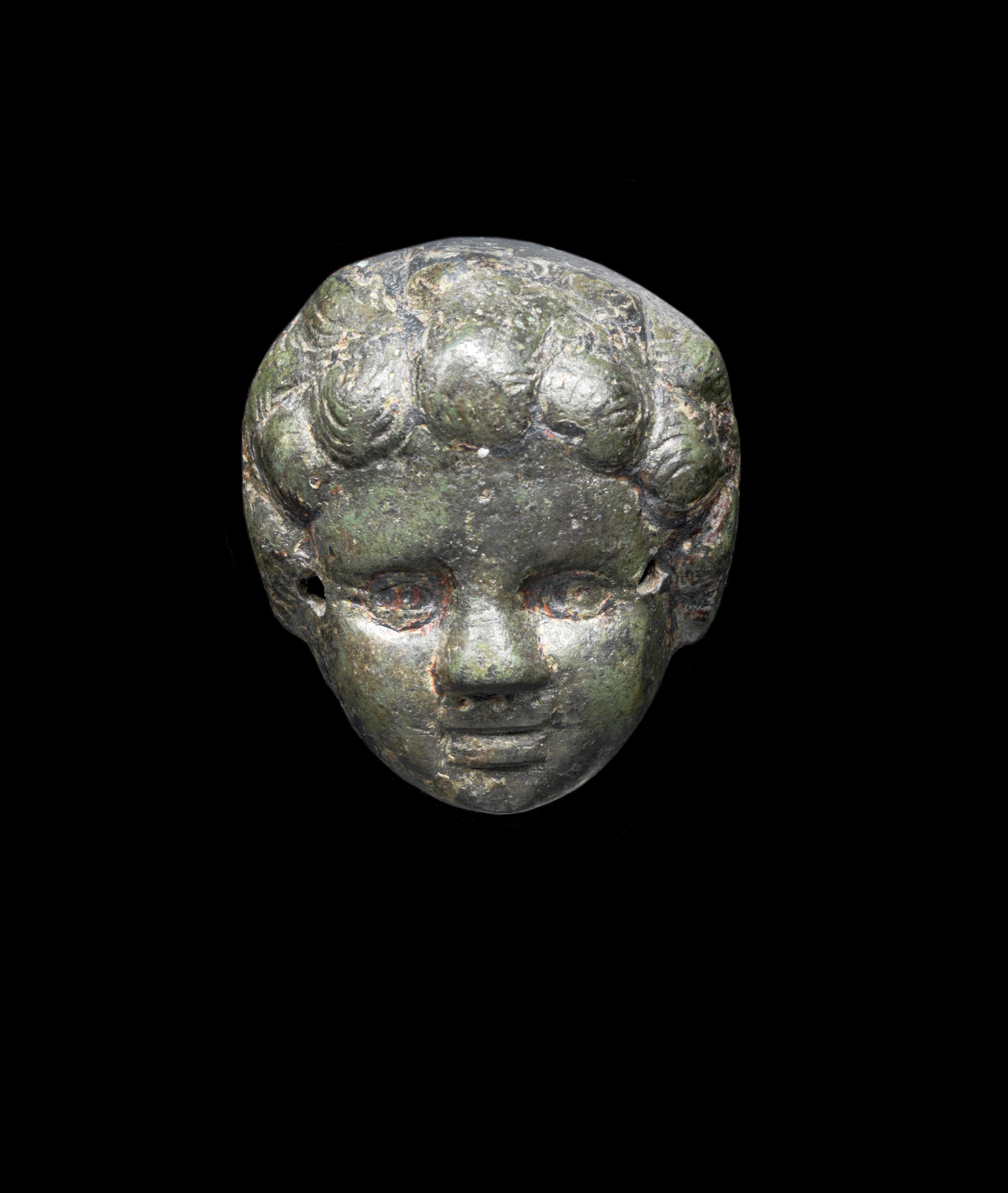 Bonhams : A Roman bronze Eros mask