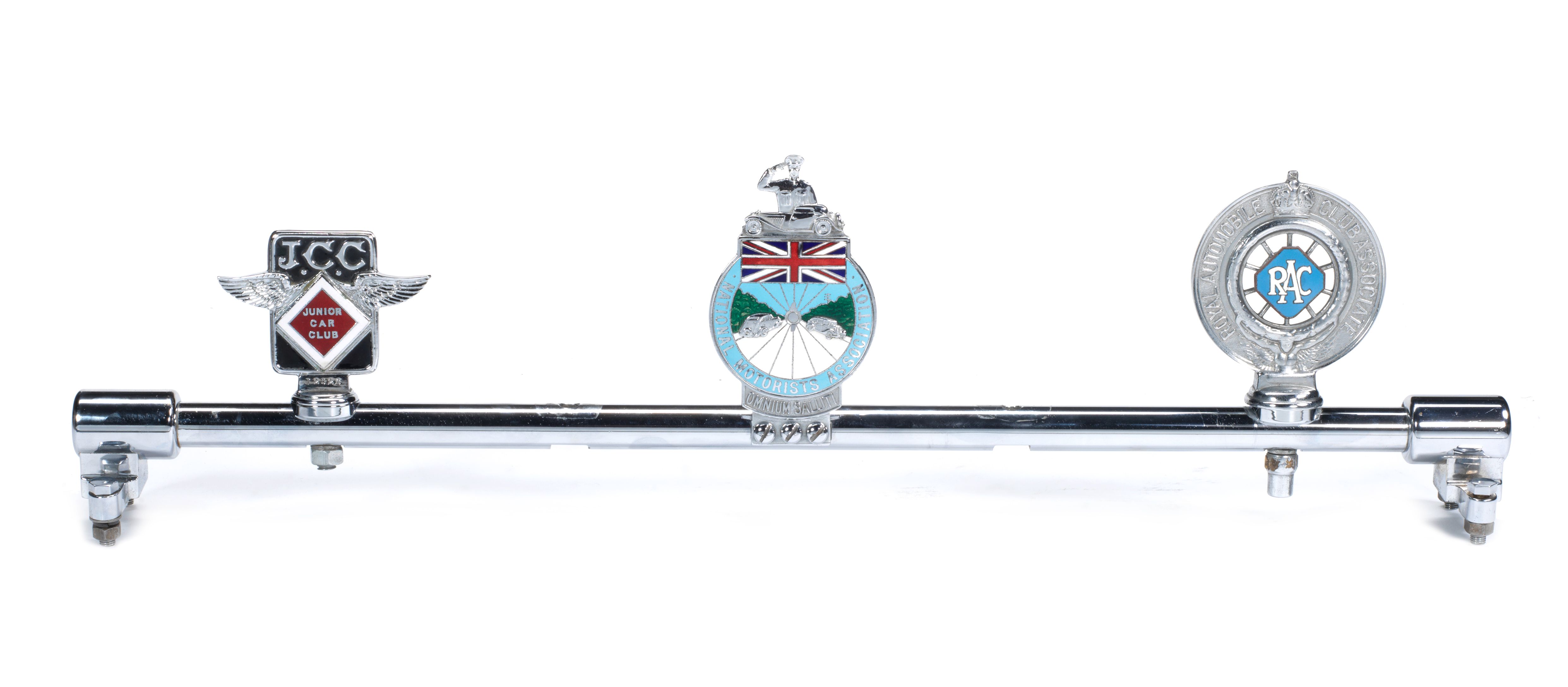 Bonhams Cars : A badge-bar mounted with three badges,