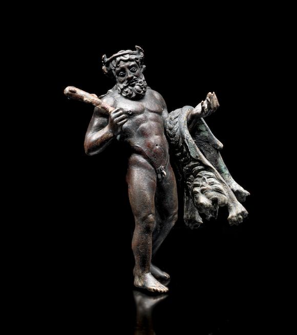 Bonhams : A Roman bronze figure of Herakles Bibax