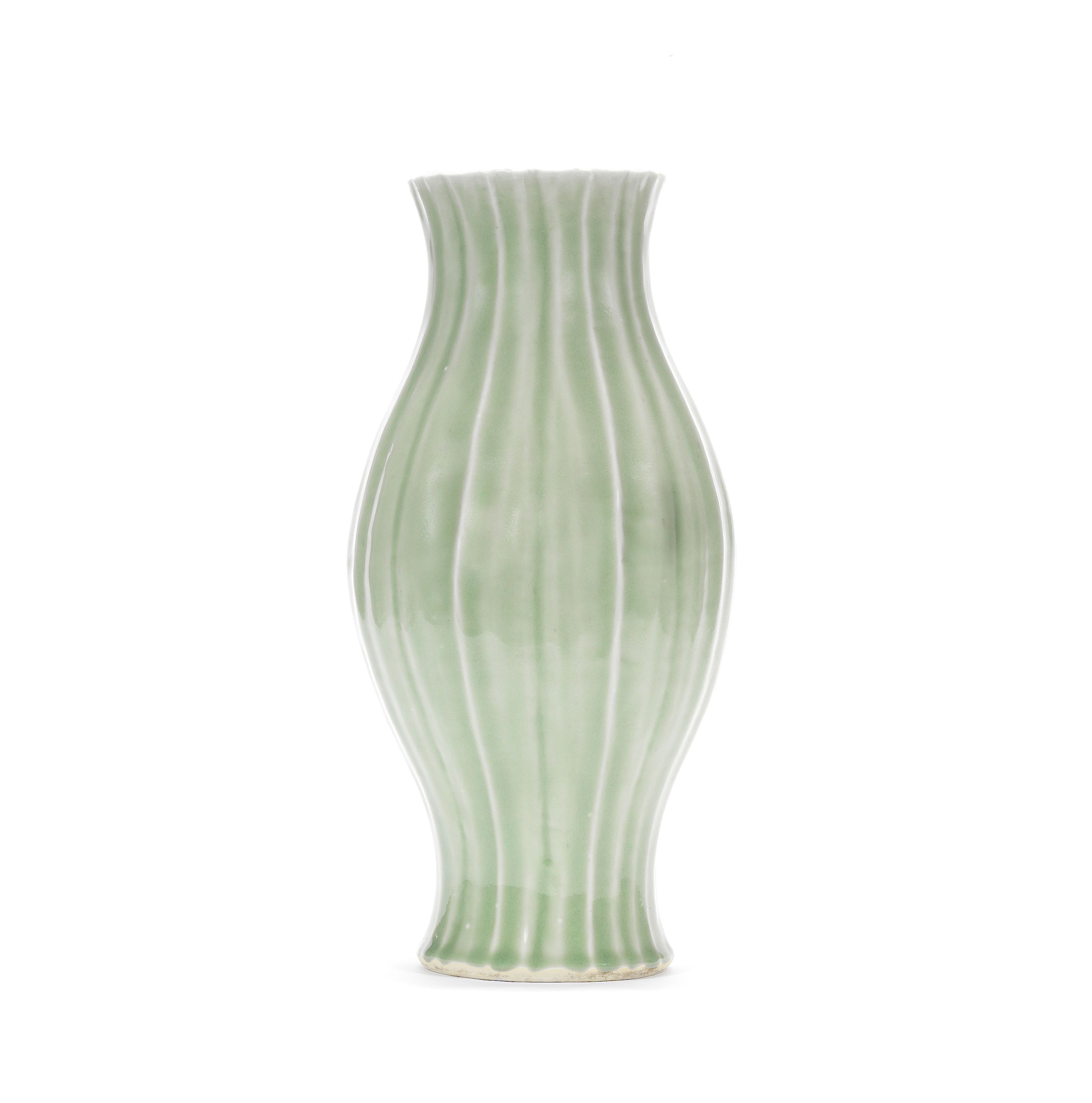 Bonhams : A large celadon-glazed ribbed slender oviform vase Early 18th ...