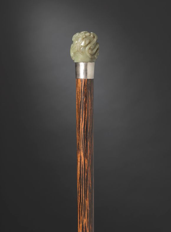 Bonhams : A Chinese jade finial now mounted on a partridge wood shaft ...