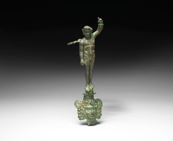 Bonhams : A Roman bronze vessel handle
