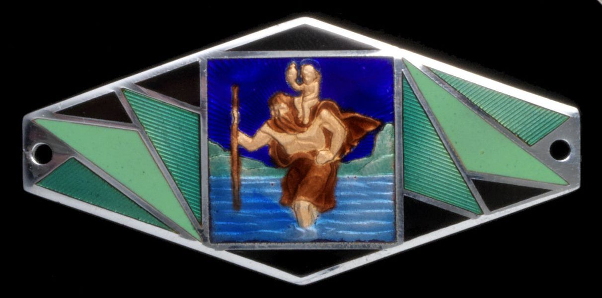 Bonhams Cars : An enamelled St Christopher dashboard plaque, 1920s,