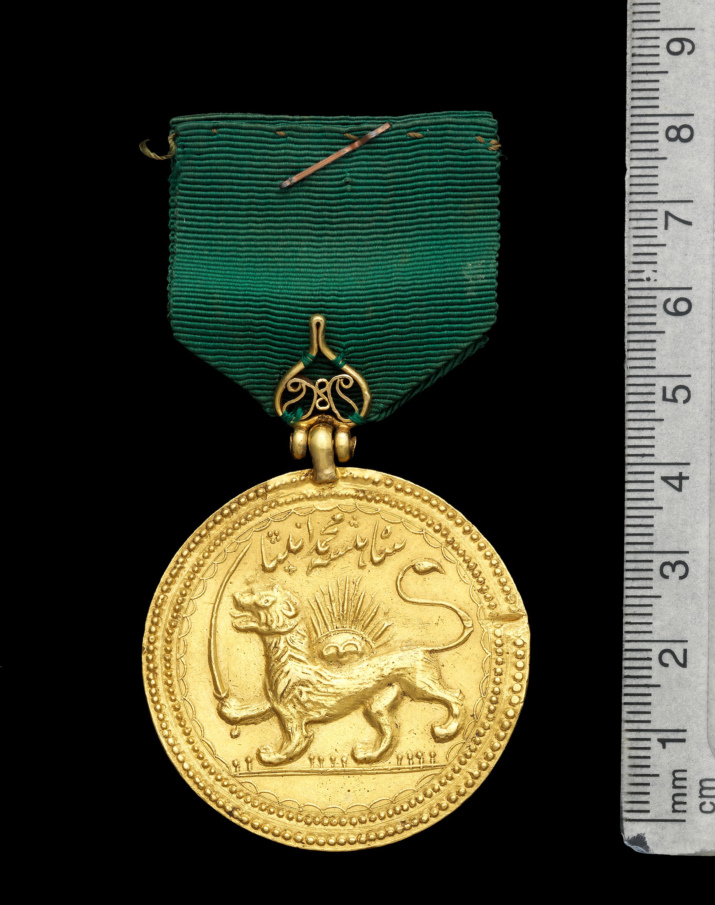 Bonhams : A Qajar gold Medal for Bravery Persia, dated AH 1260/ AD 1844