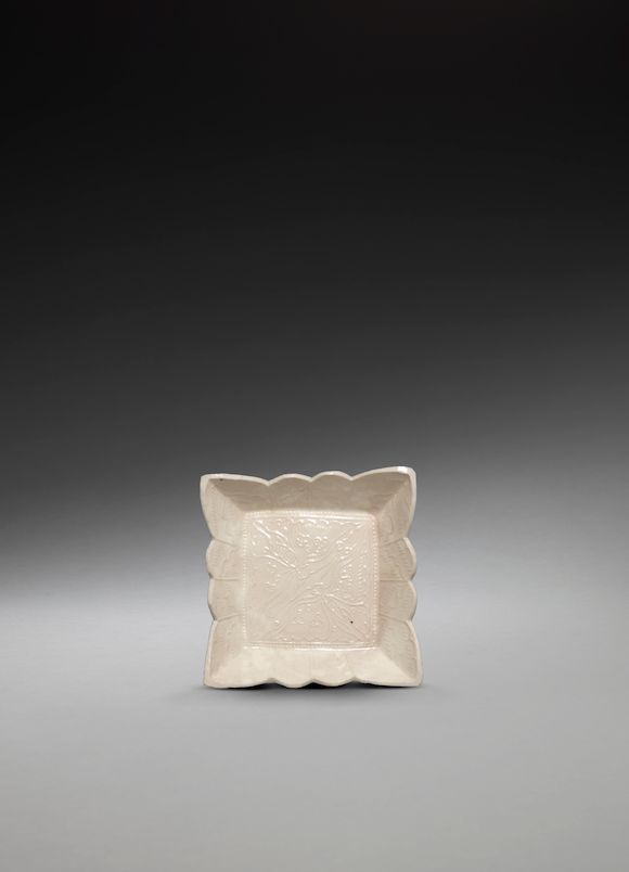 Bonhams : A small white-glazed moulded square dish Liao Dynasty