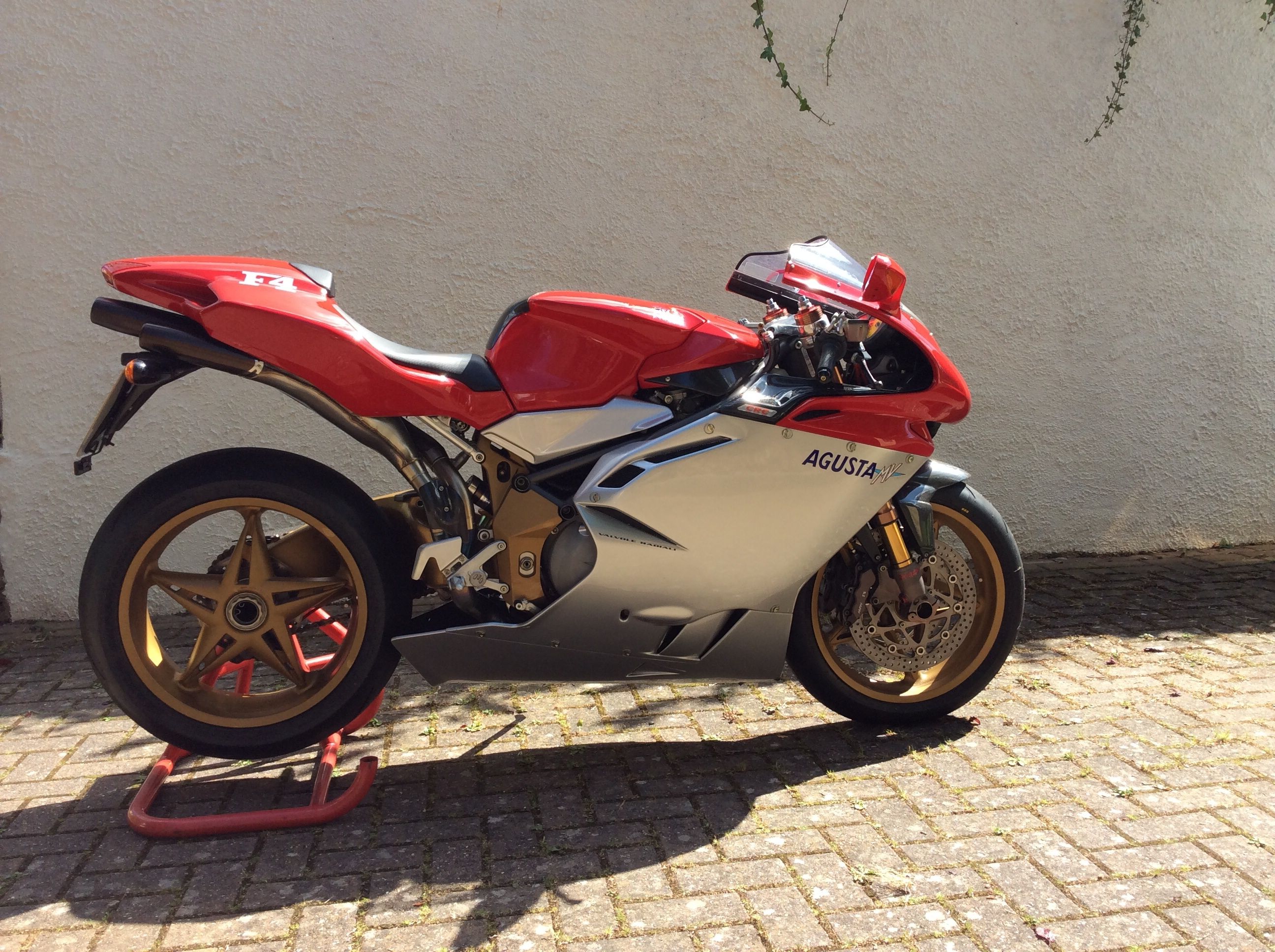 Bonhams Cars : One owner, 8,900 miles from new,1999 MV Agusta 750cc F4 'Serie Oro' Frame no ...