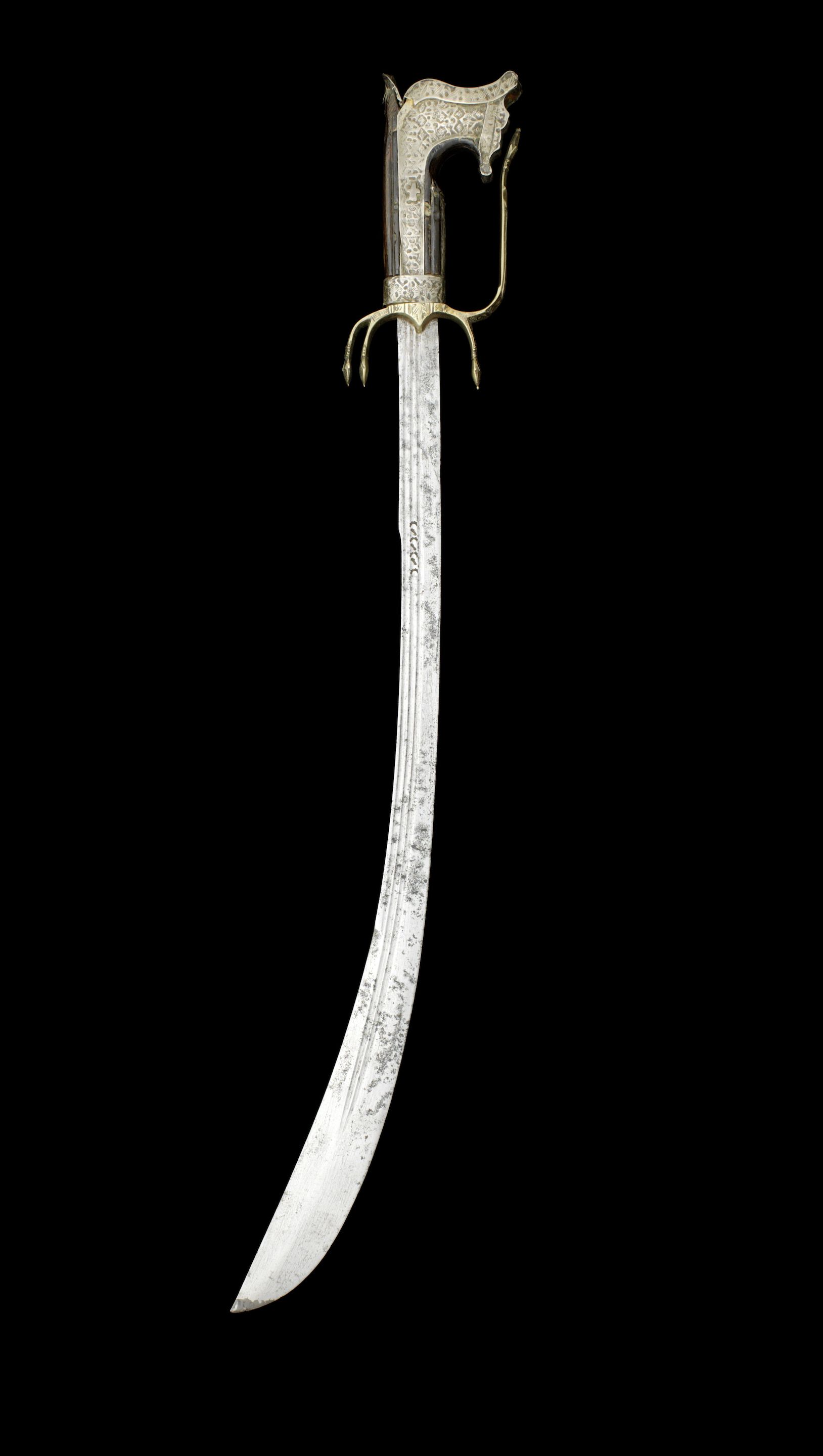 Bonhams : An Algerian horn-hilted steel Sword (nimcha) North Africa ...