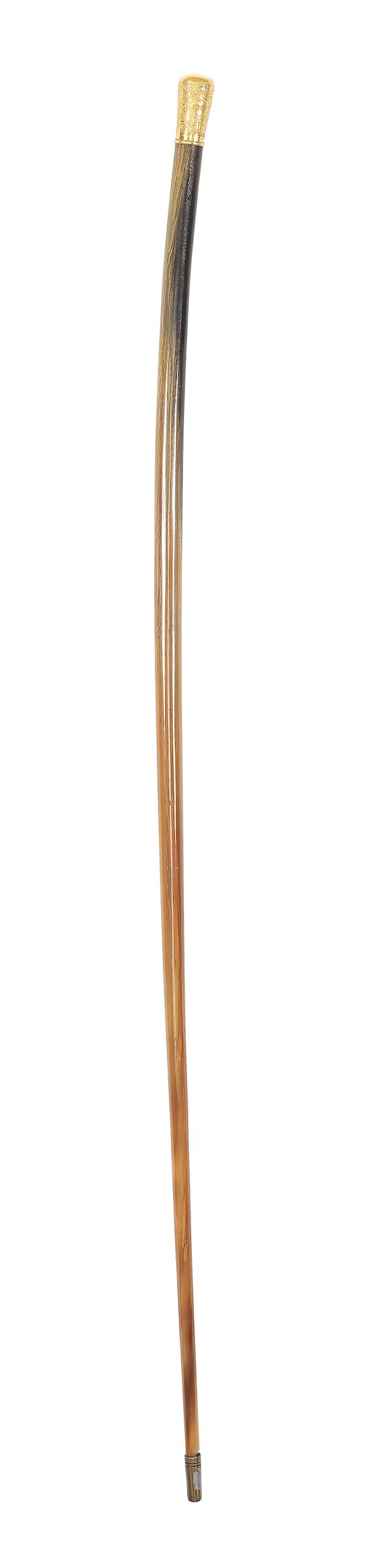 Bonhams : A gold-mounted cattle horn walking cane 20th century