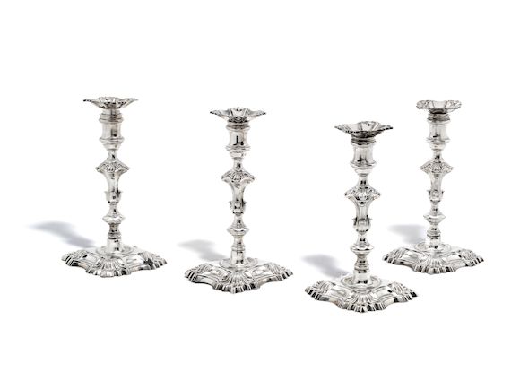 Bonhams : A set four George II cast silver candlesticks maker's mark of ...