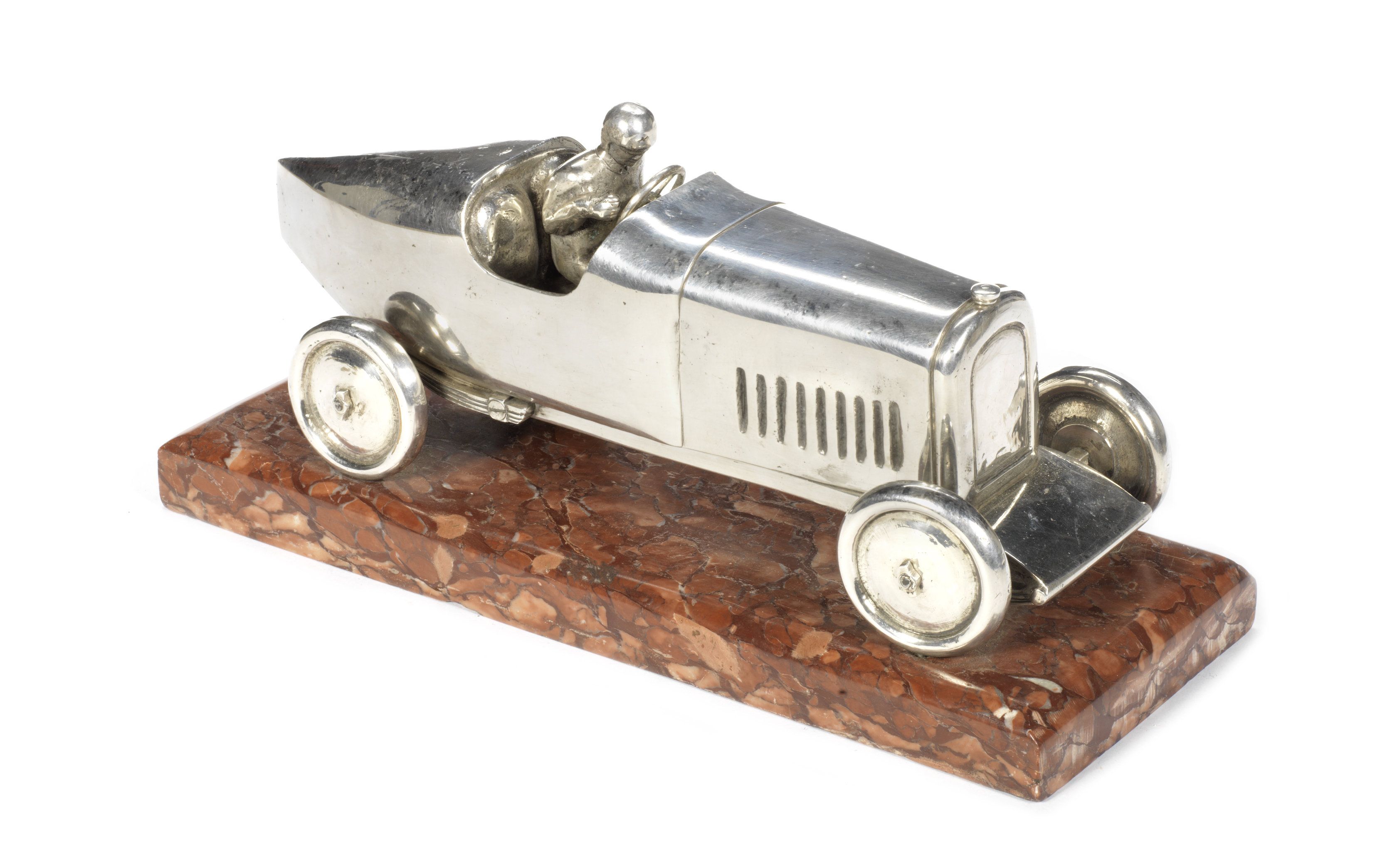 Bonhams Cars : A bronze sculpture of a racing car, German, circa 1920,