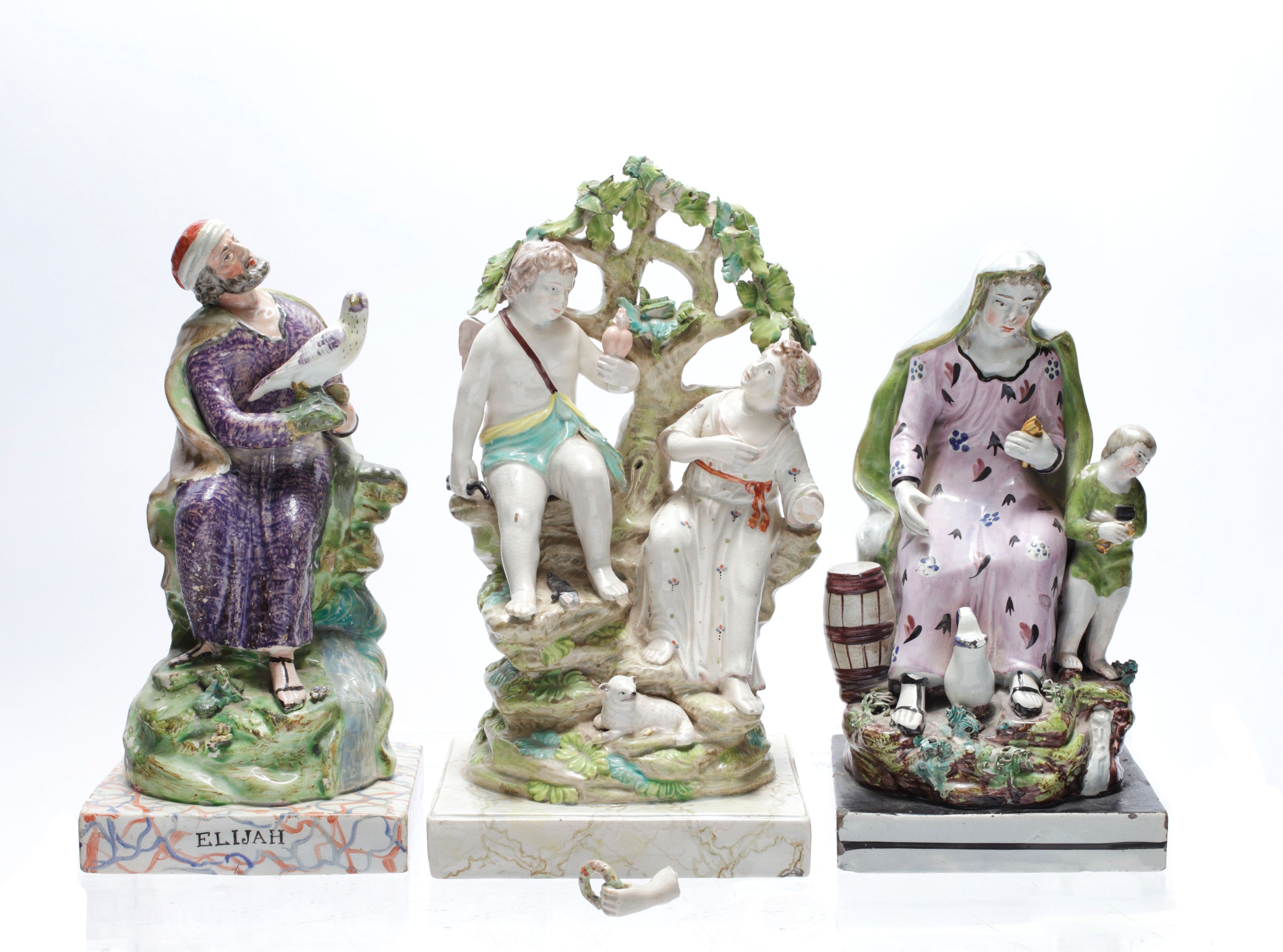 Bonhams : A pearlware figure group, and two pearlware figures of Elijah ...