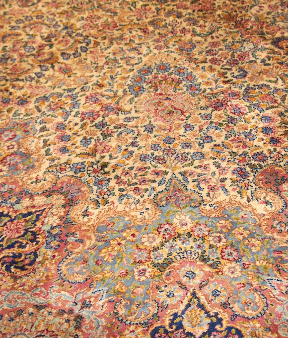 Bonhams : A Kirman design machine made carpet 551cm x 302cm