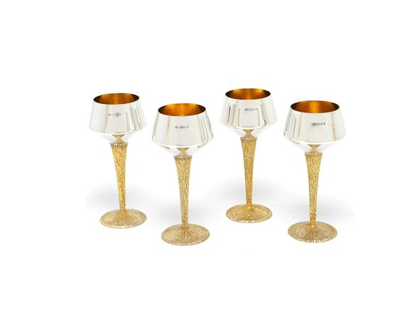 Bonhams : STUART DEVLIN: A set of four silver and silver-gilt goblets ...