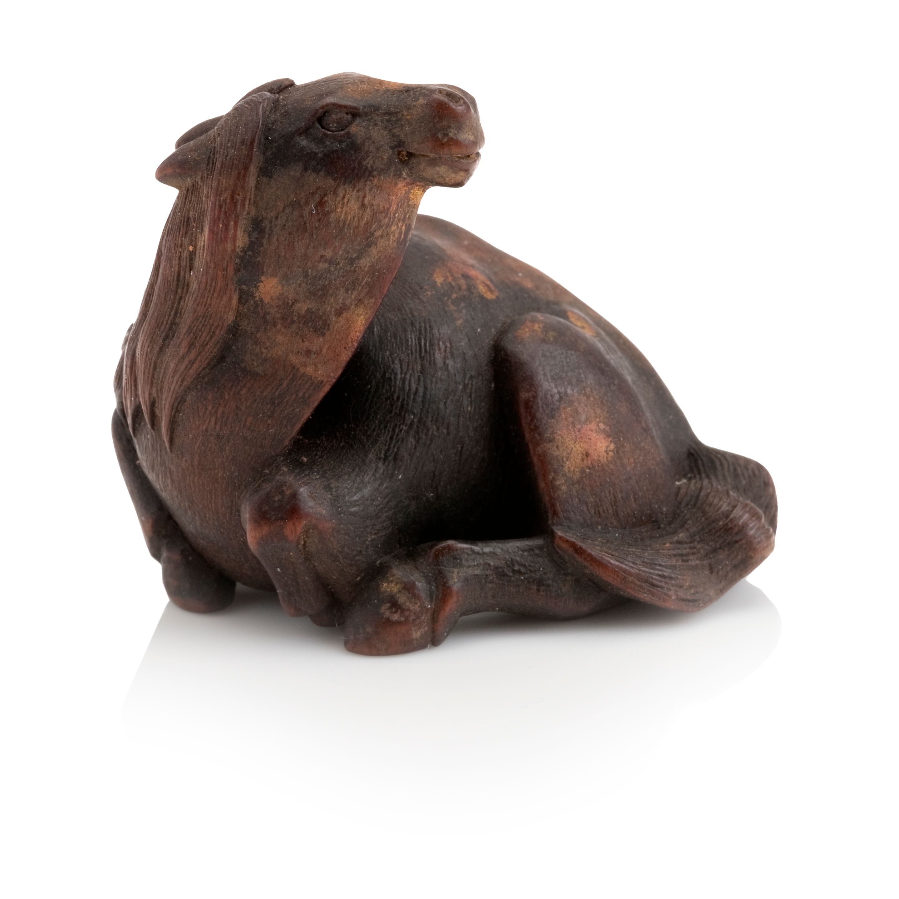 Bonhams : A wooden netsuke of a horse Signed Ikkan, Meiji