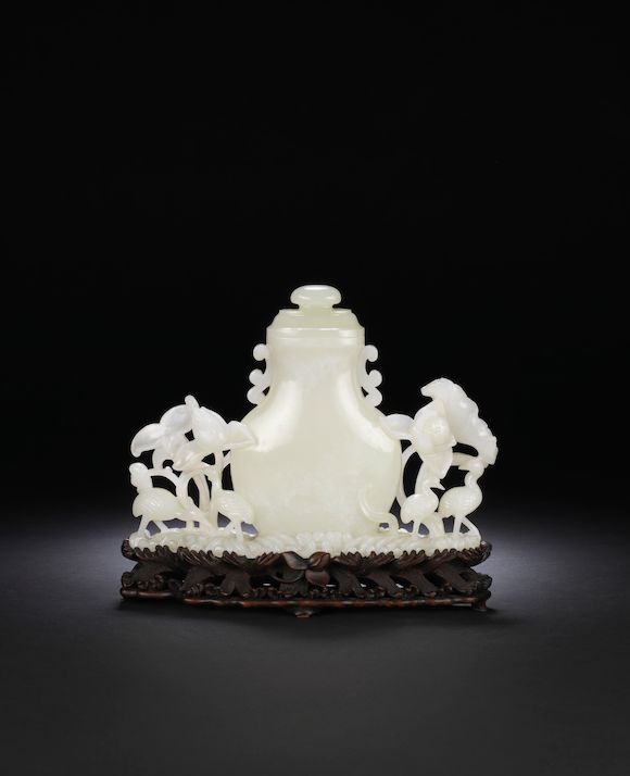 Bonhams : A fine and rare 'sodden snow' white jade 'egrets and lotus ...
