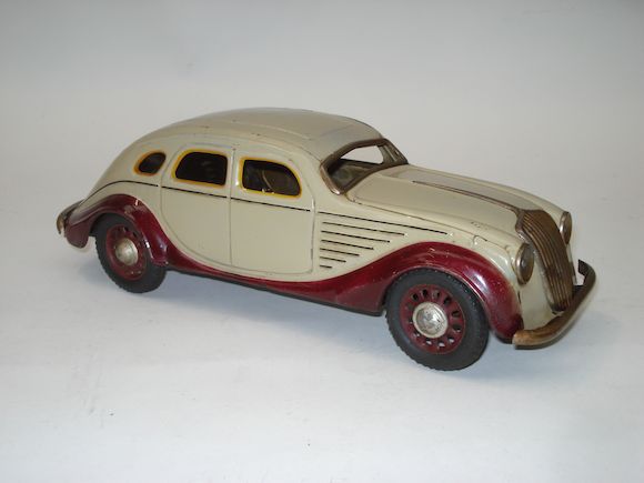 Bonhams : Tinplate c/w streamline car, German 1950s