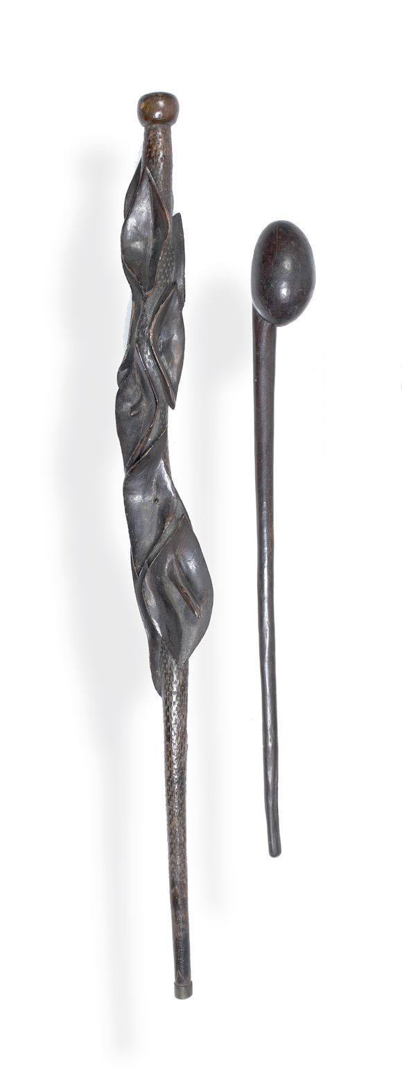 Bonhams : A Zulu club and an African carved walking stick