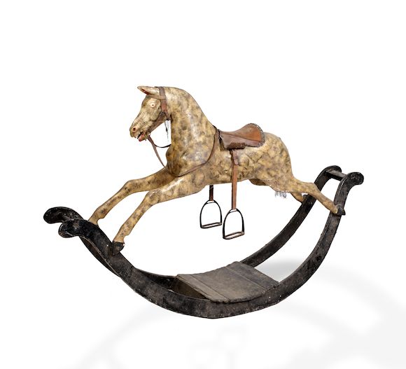 Bonhams : A Victorian dappled grey rocking horse on bow rockers