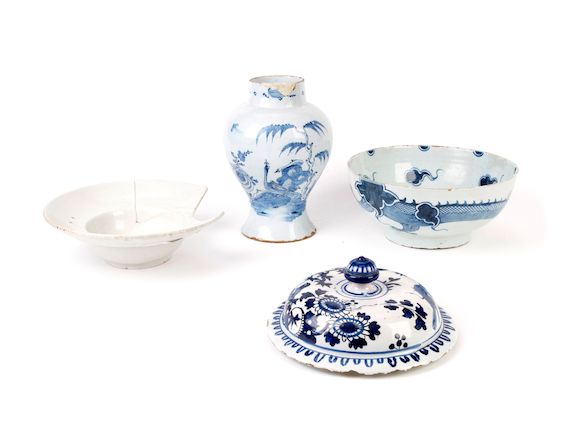 Bonhams : An English Delftware vase, a small punchbowl, an odd cover ...