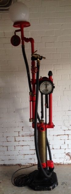 Bonhams Cars : A Gilbert & Barker Model E235 skeleton petrol pump,