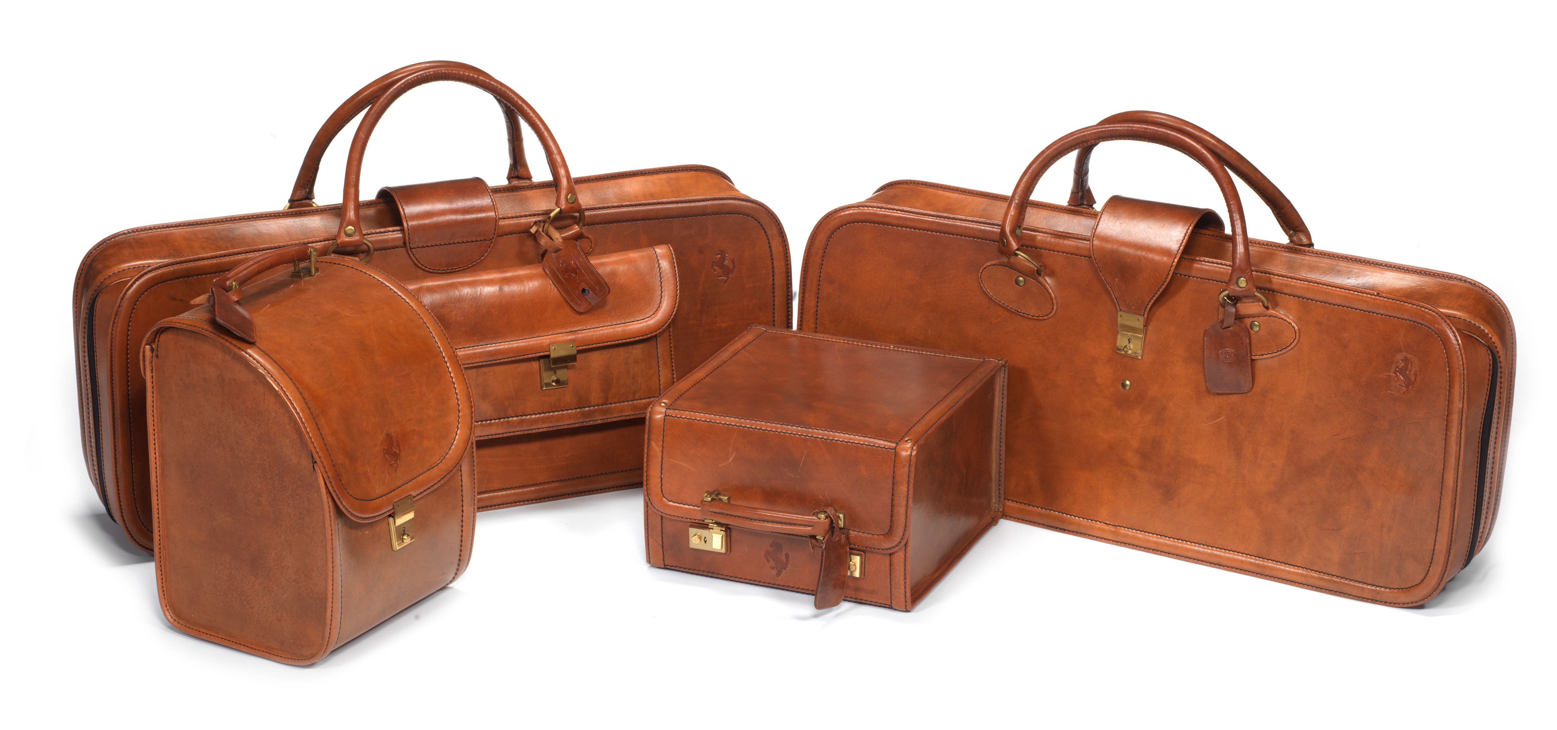 Bonhams Cars : A four piece set of Ferrari leather luggage by Cuolo of ...