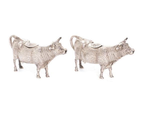 Bonhams : A pair of 20th century German silver cow creamers in the ...
