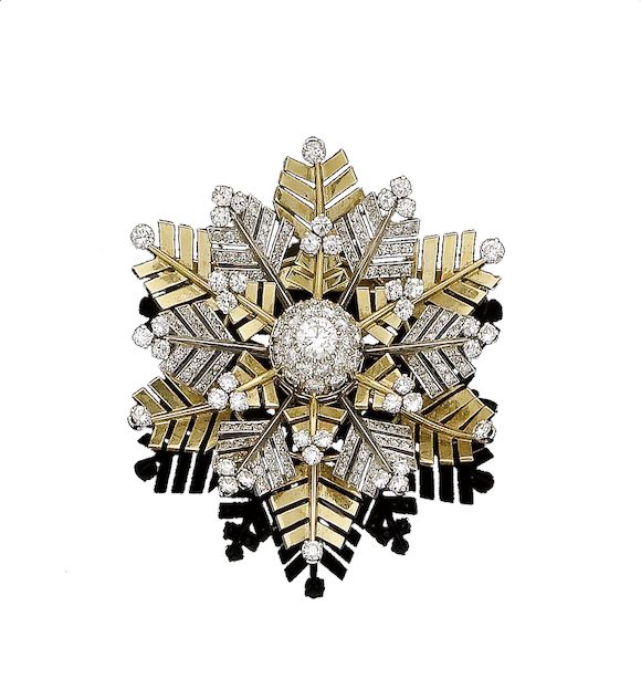 Bonhams : A diamond snowflake brooch,