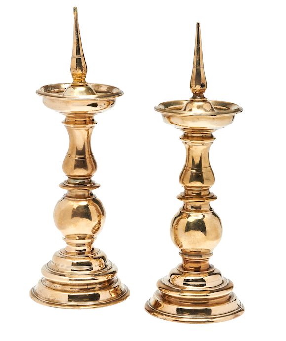 Bonhams : A pair of 17th century style brass pricket candlesticks ...