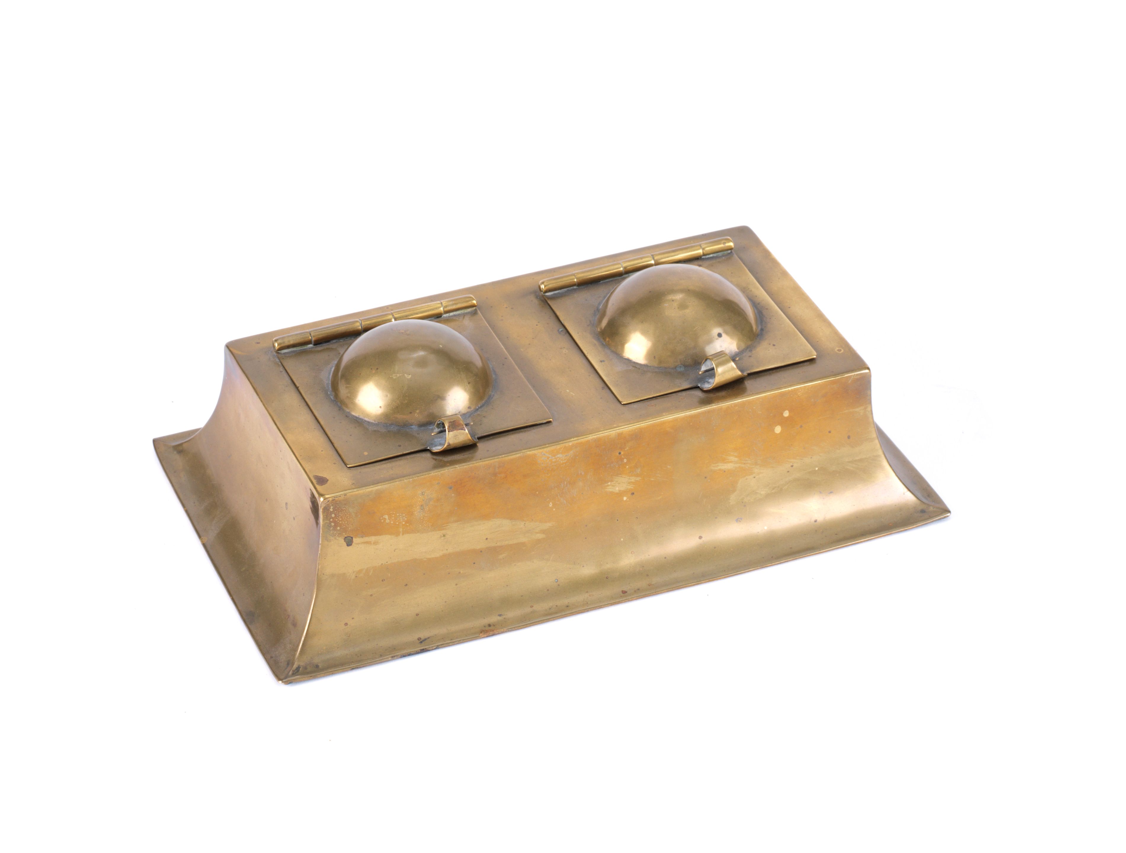 Bonhams : An Arts and Crafts copper inkwell Designed by C.F.A Voysey