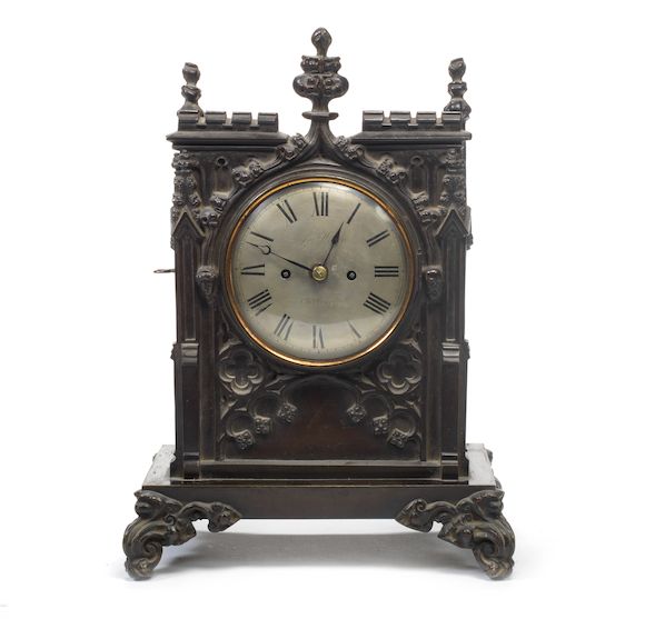 Bonhams : A mid 19th century patinated bronze mantel clock in the ...