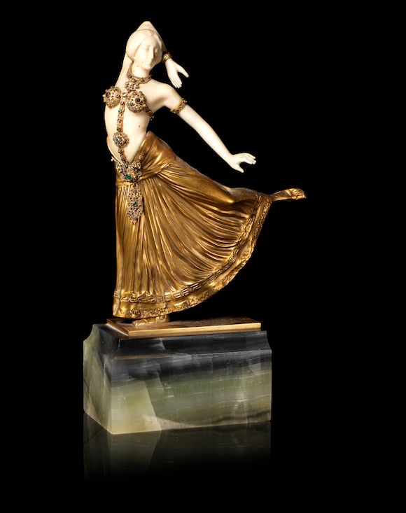 Bonhams : In the manner of Colinet An Art Deco Bronze and Carved Ivory ...