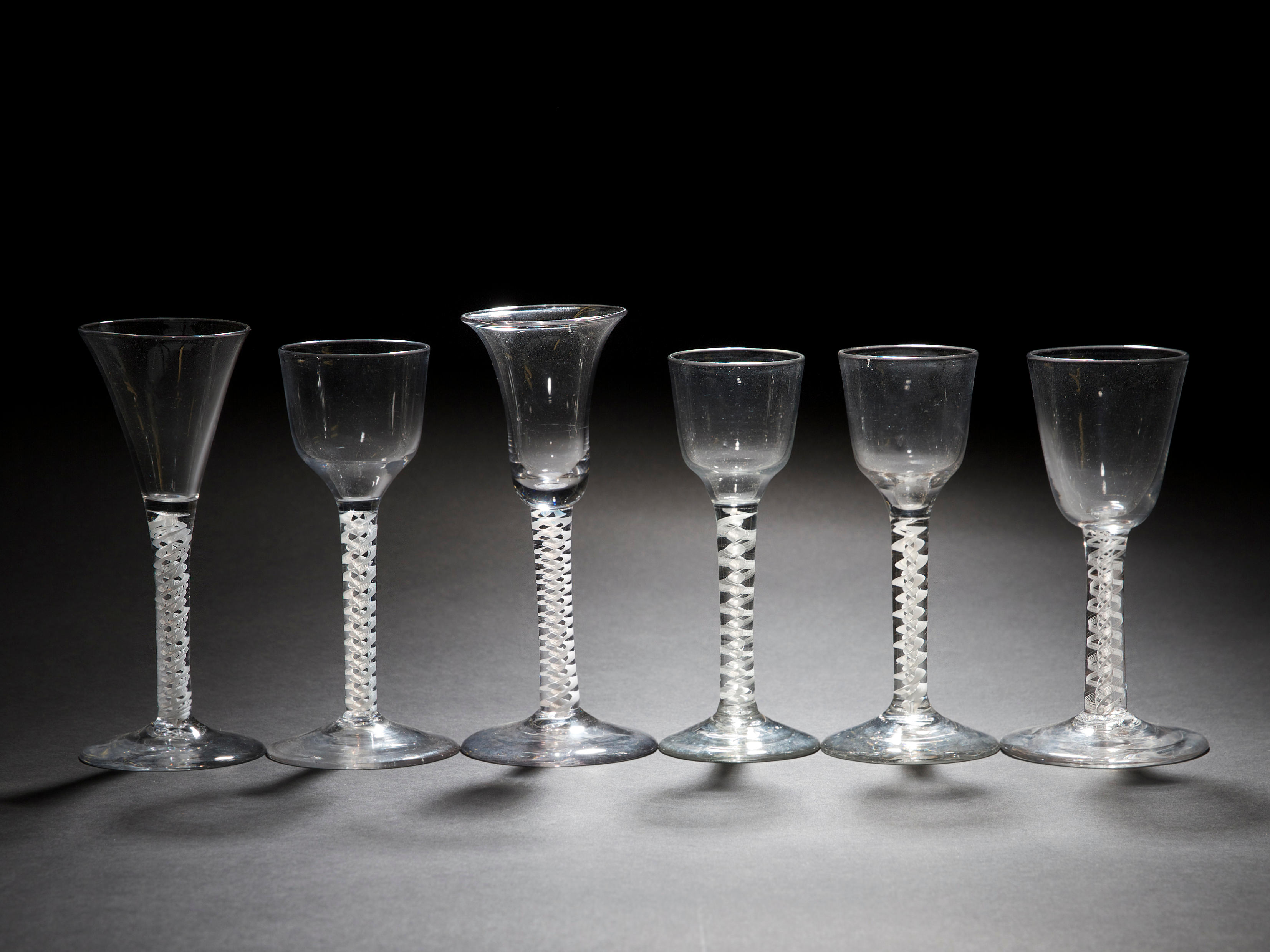 Bonhams Six Opaque Twist Wine Glasses Circa 1765 70