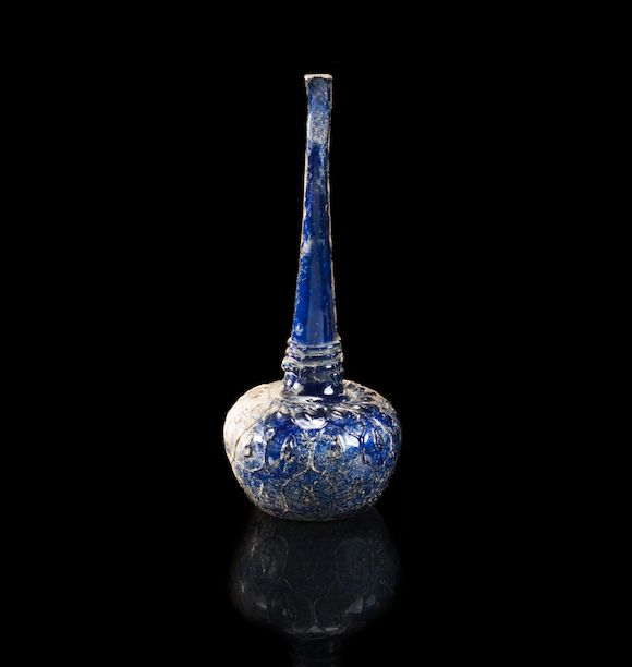 Bonhams : A mould-blown glass Flask Persia, 12th/ 13th Century