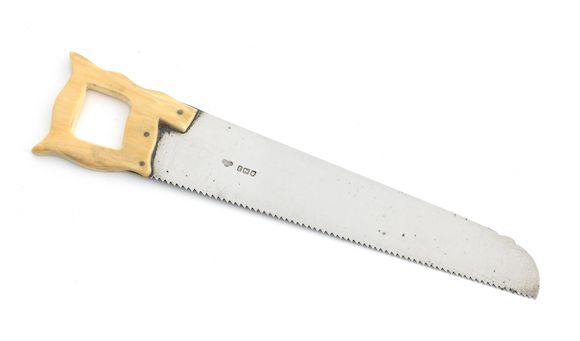 Bonhams : An Edwardian ivory mounted silver cucumber saw by Goldsmiths ...